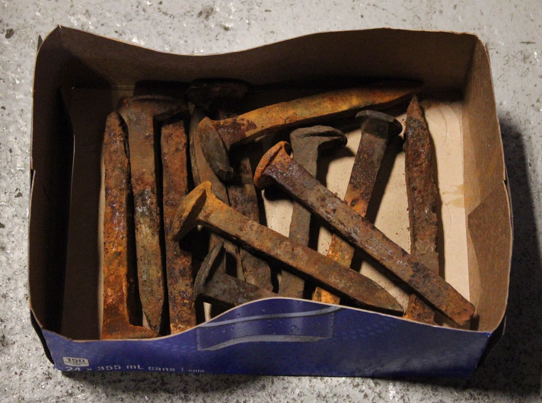 ANTIQUE CAST IRON RAILROAD SPIKES SET OF 12