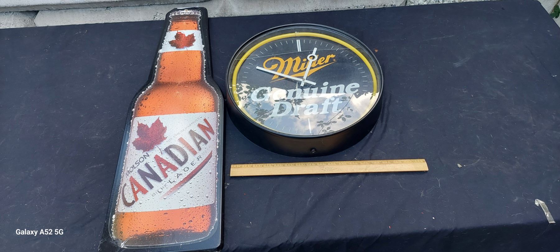 Large MGD clock 16.5" diameter & Molson Canadian wood bottle sign 31"x10"
