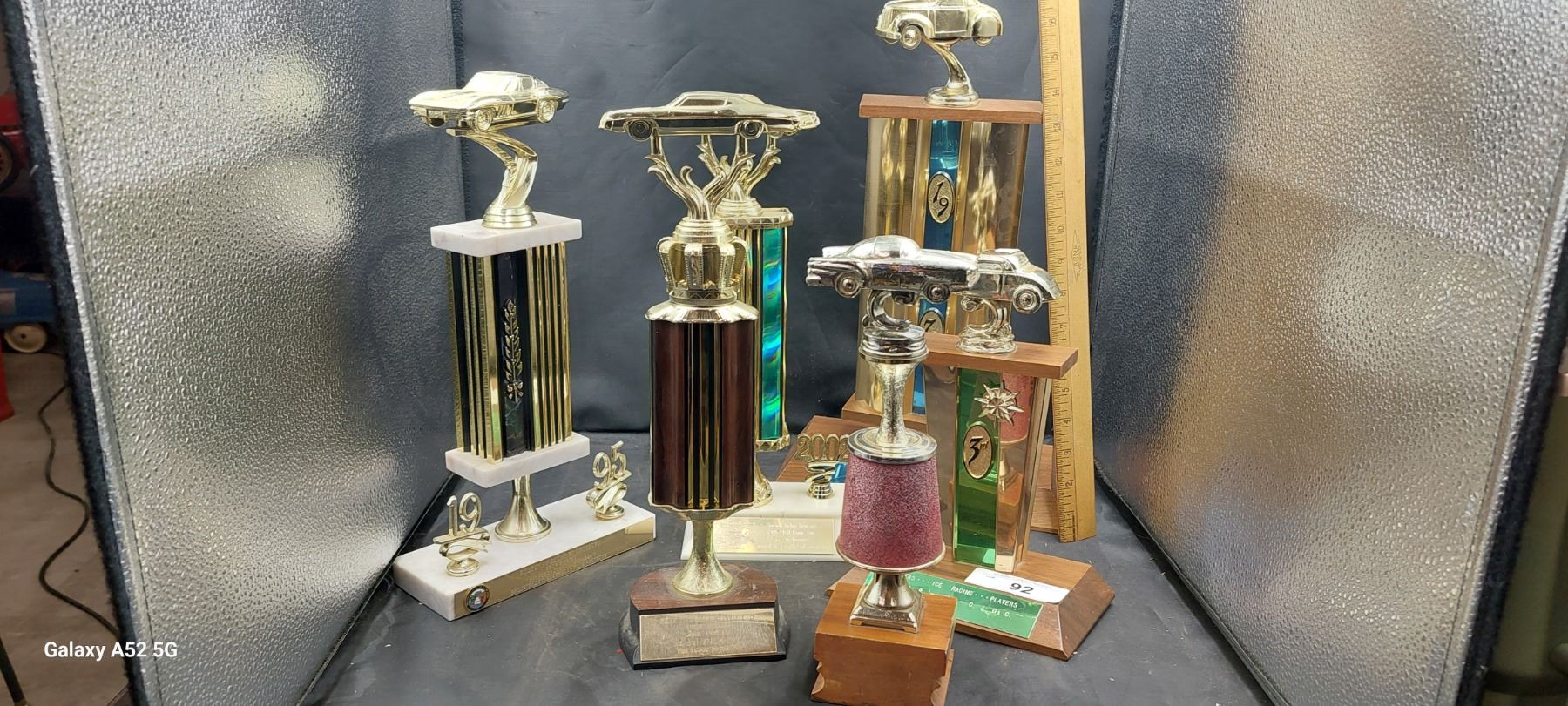 6 large 1970s hot rod/racing trophies, sizes 10"-16" tall