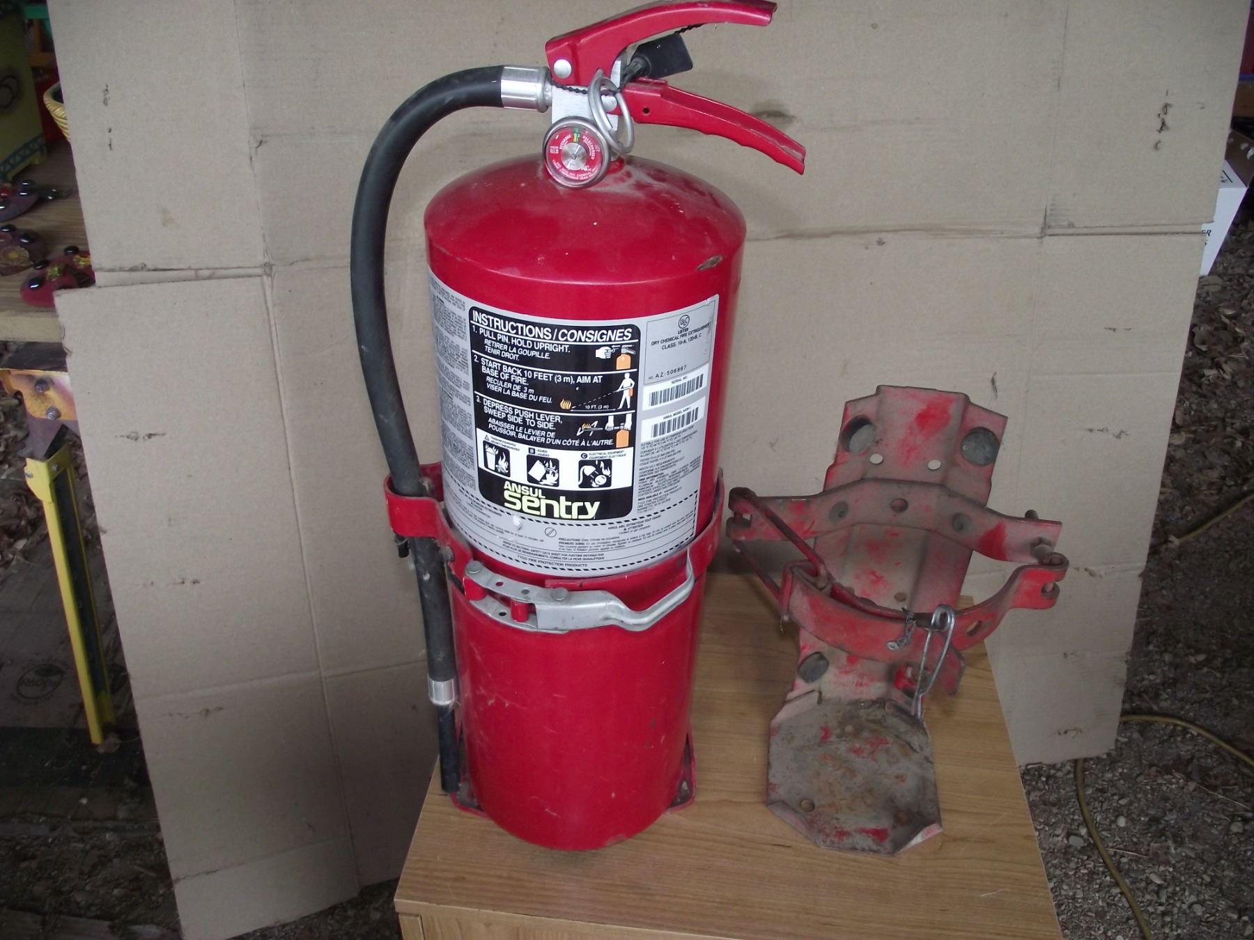 1 -20 lb fire extinguisher (as new condition), and 1- 10 lb ext. cradle ...