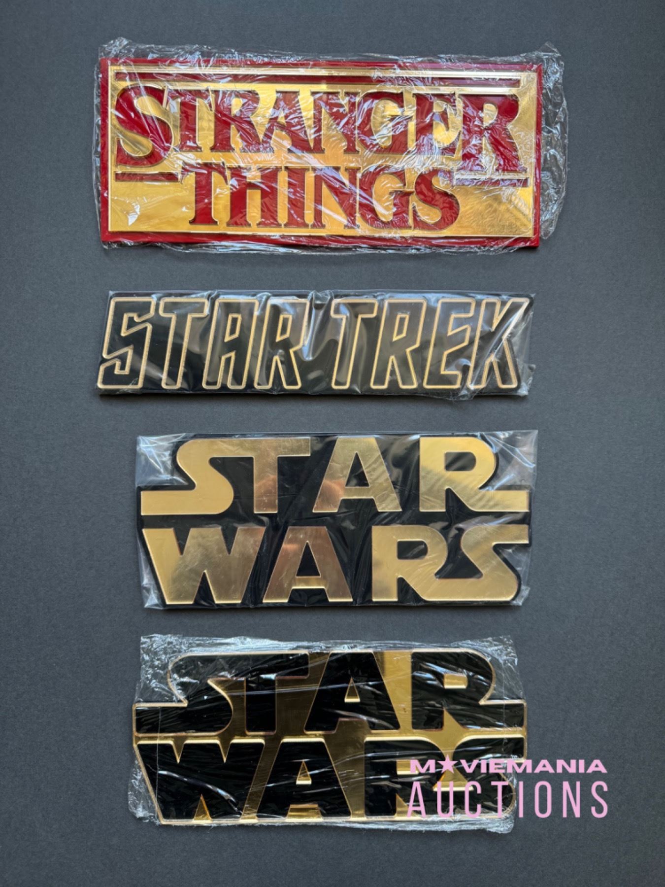 A Collection of Mirrored Signs featuring Stranger Things, Star Wars and ...