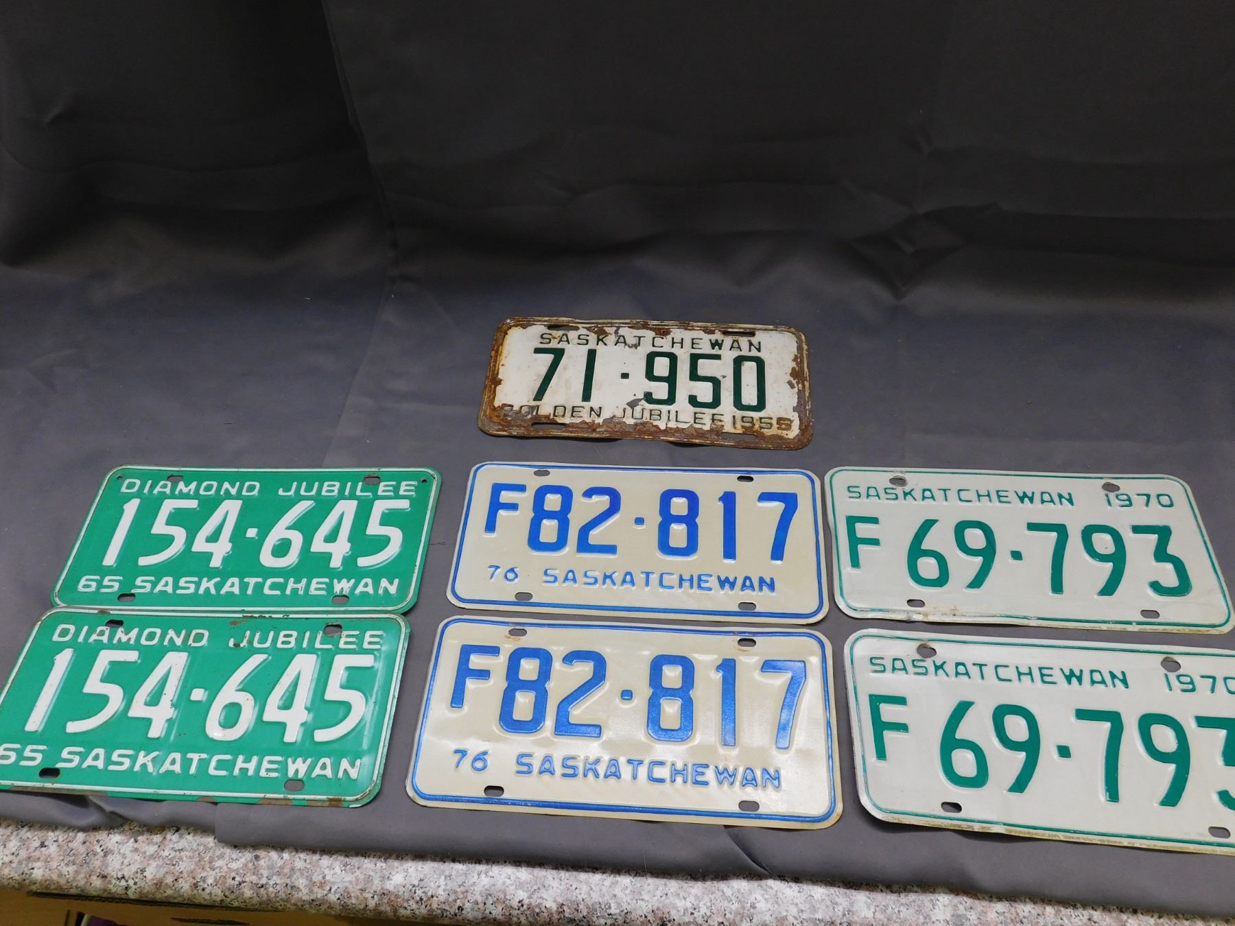 Lot of 7 Saskatchewan License Plates 3 Pairs 1 Single 1970, 1976, 1965 ...