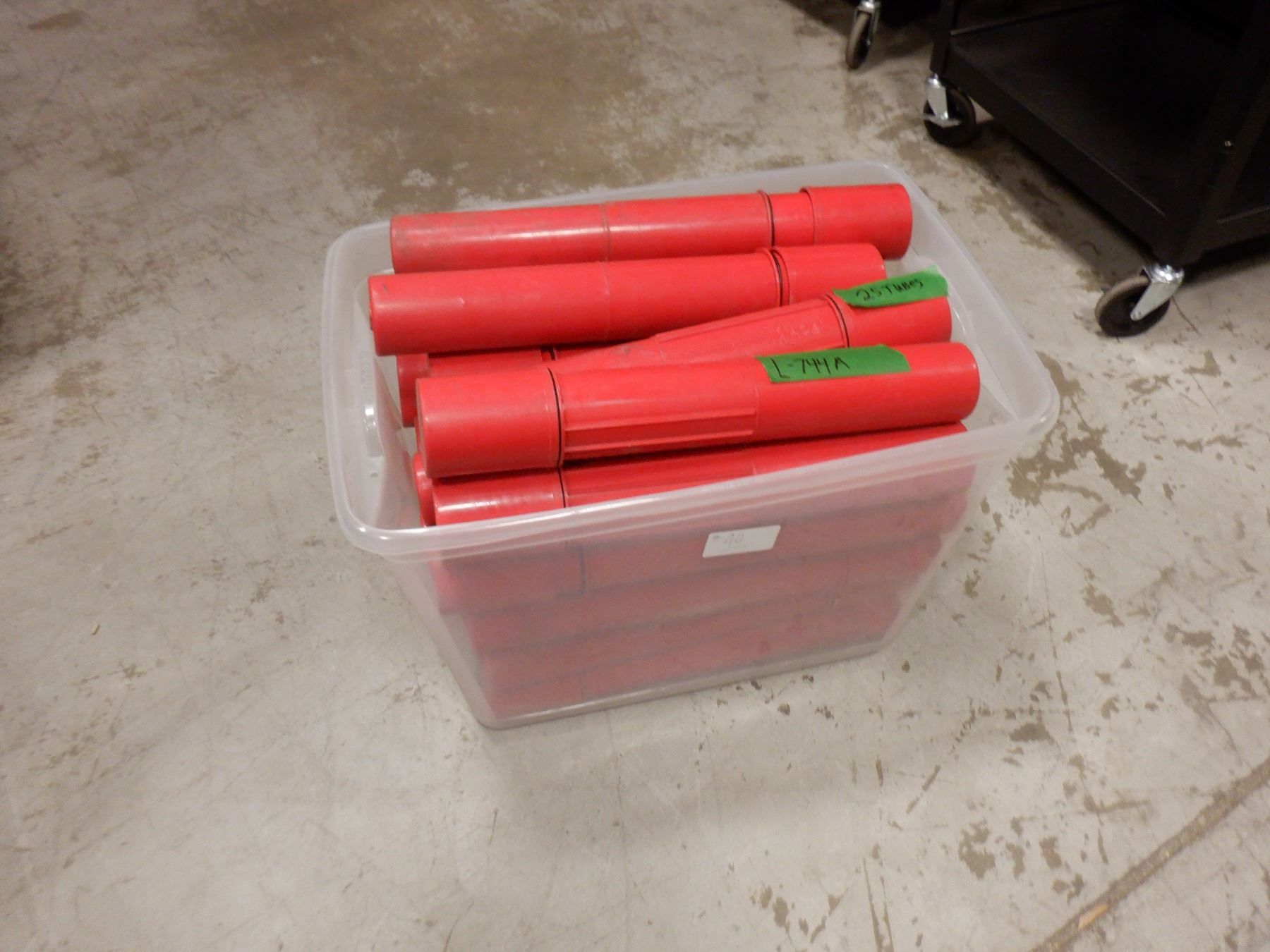Container of 25 plastic storage tubes