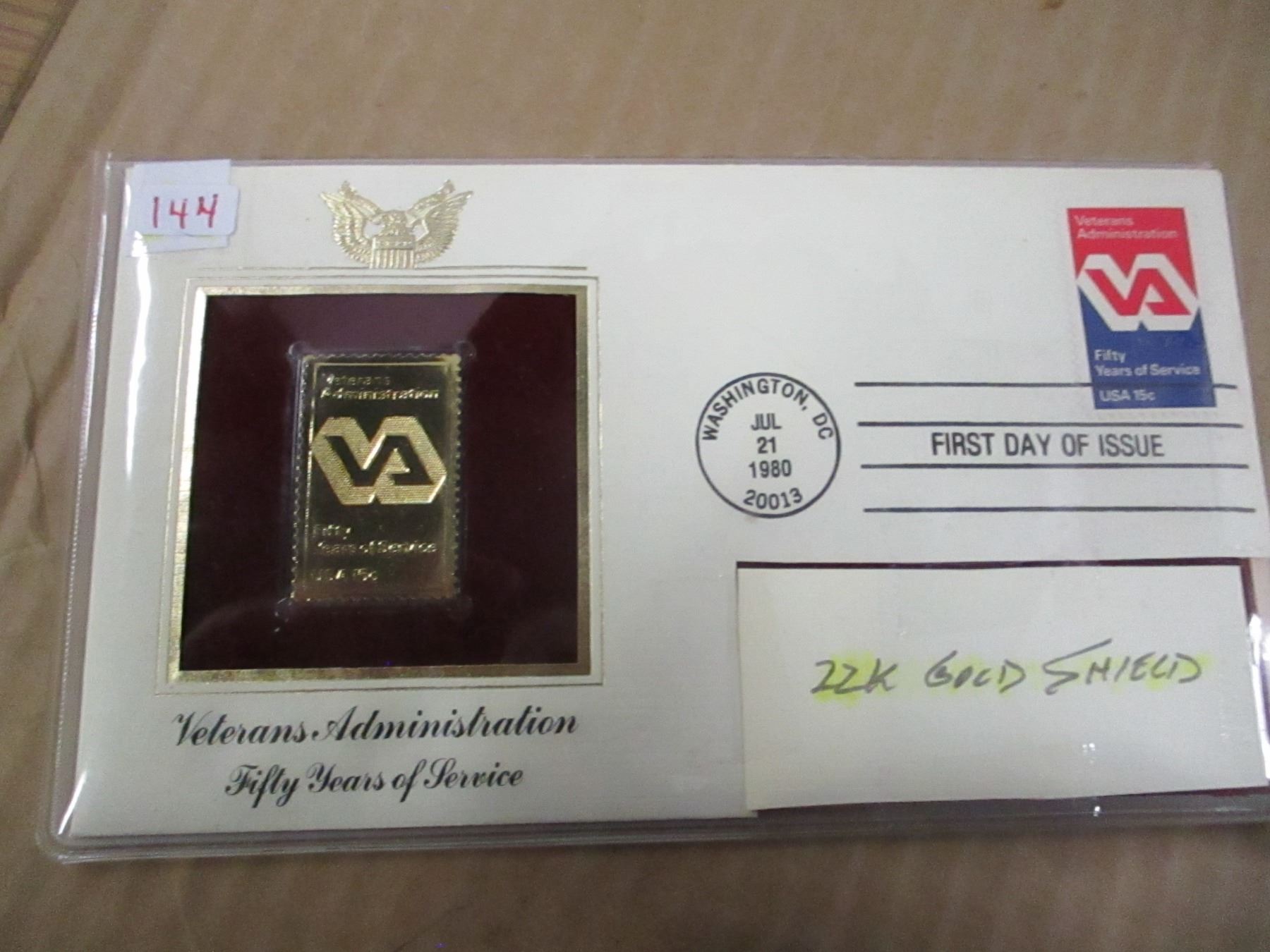22 KT GOLD SHIELD VETERANS 50 YEARS OF SERVICE STAMP