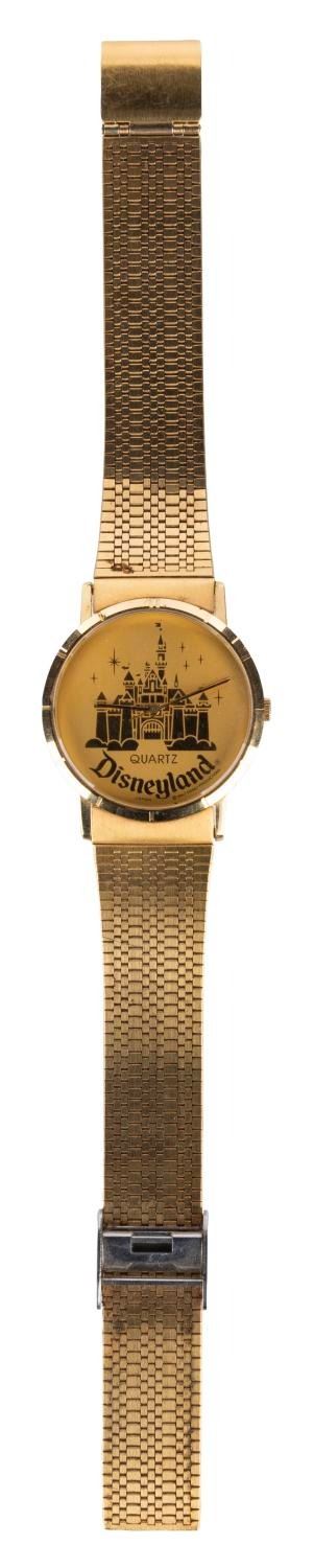 A Gold-Toned Disneyland Sleeping Beauty Castle Watch. - Van Eaton Galleries