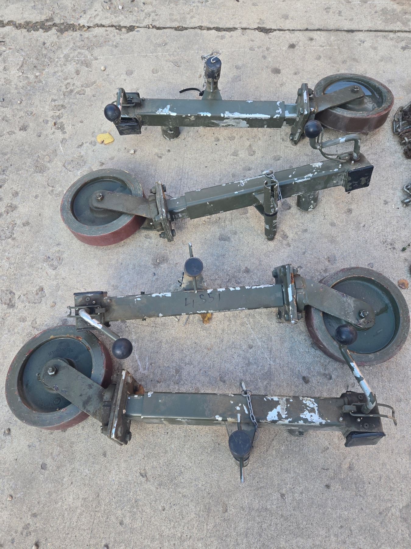 Four military screw jacks