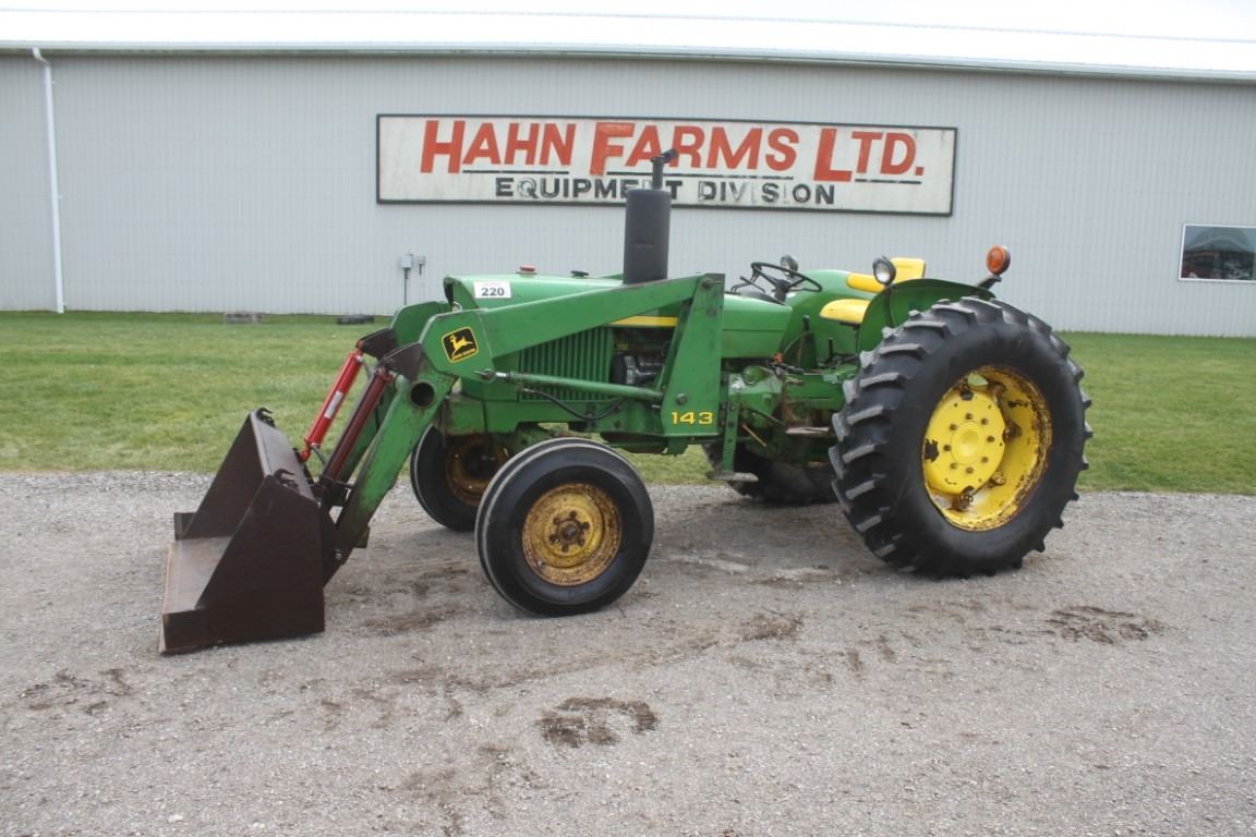 JD 1120 2wd tractor, 143 loader, showing 994 hours