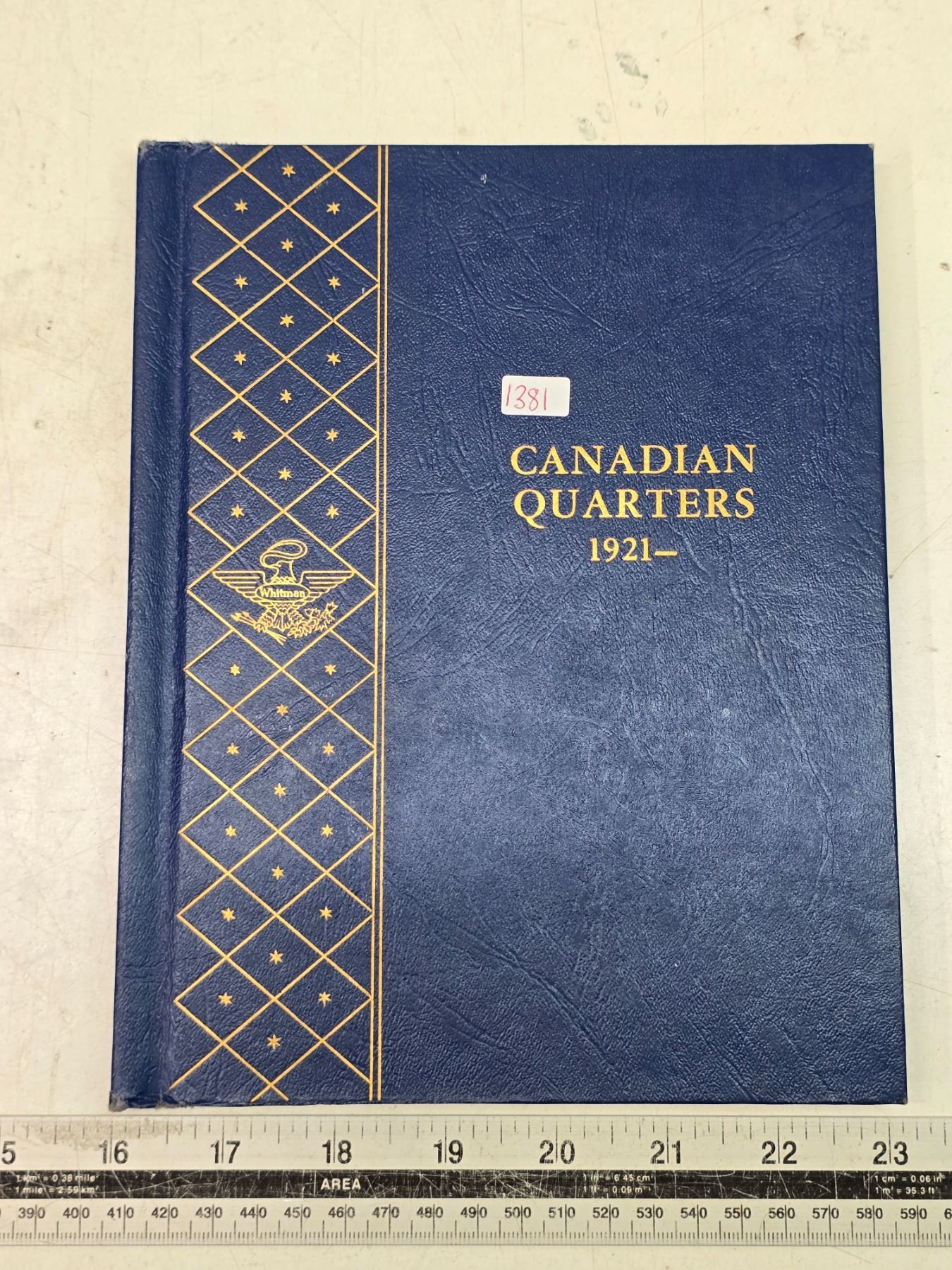 Deluxe blue whitman book quarter set - w/ 1 coin - Schmalz Auctions