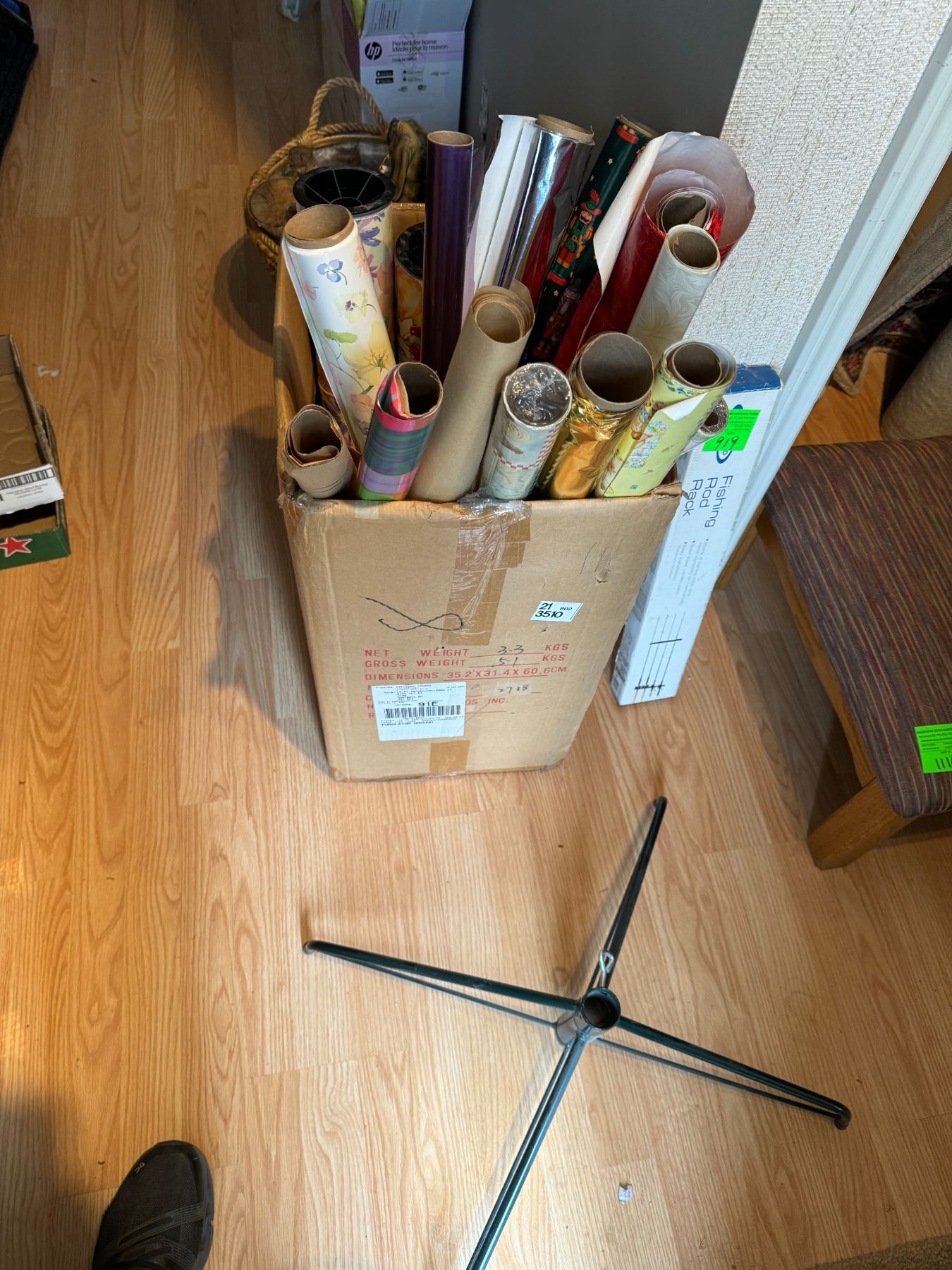 Gift wrap, and Christmas tree stand