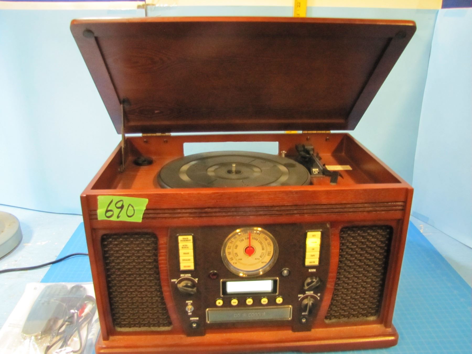 Tabletop radio with CD player , record player , cassette deck