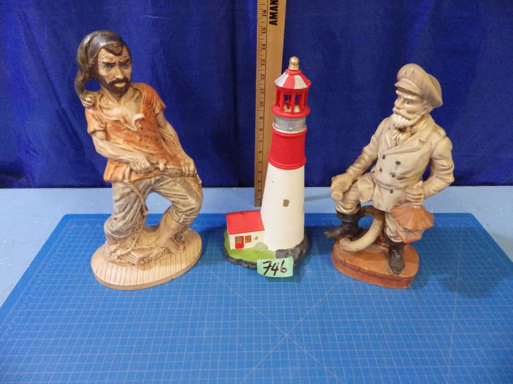 Ceramic sea captain sailor and lighthouse