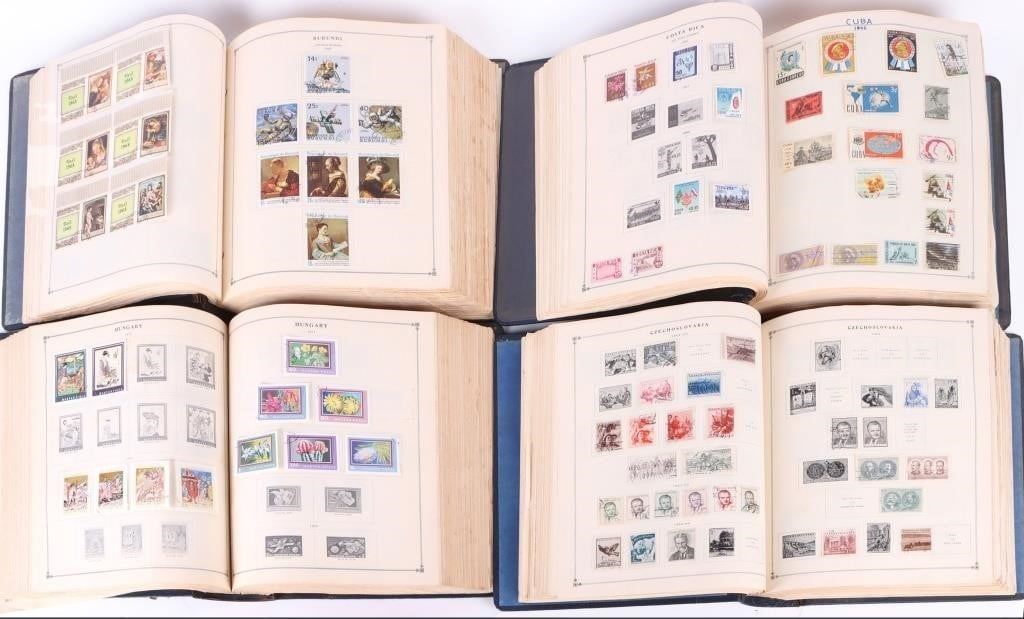 SCOTT INTERNATIONAL POSTAGE STAMP ALBUMS - (4)