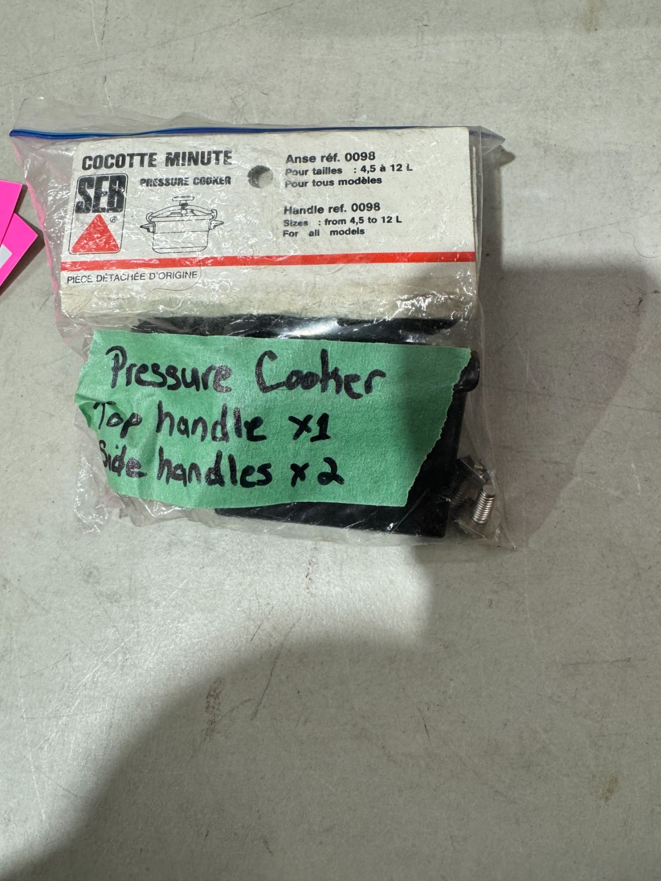Pressure cooker, top handle, and side handles