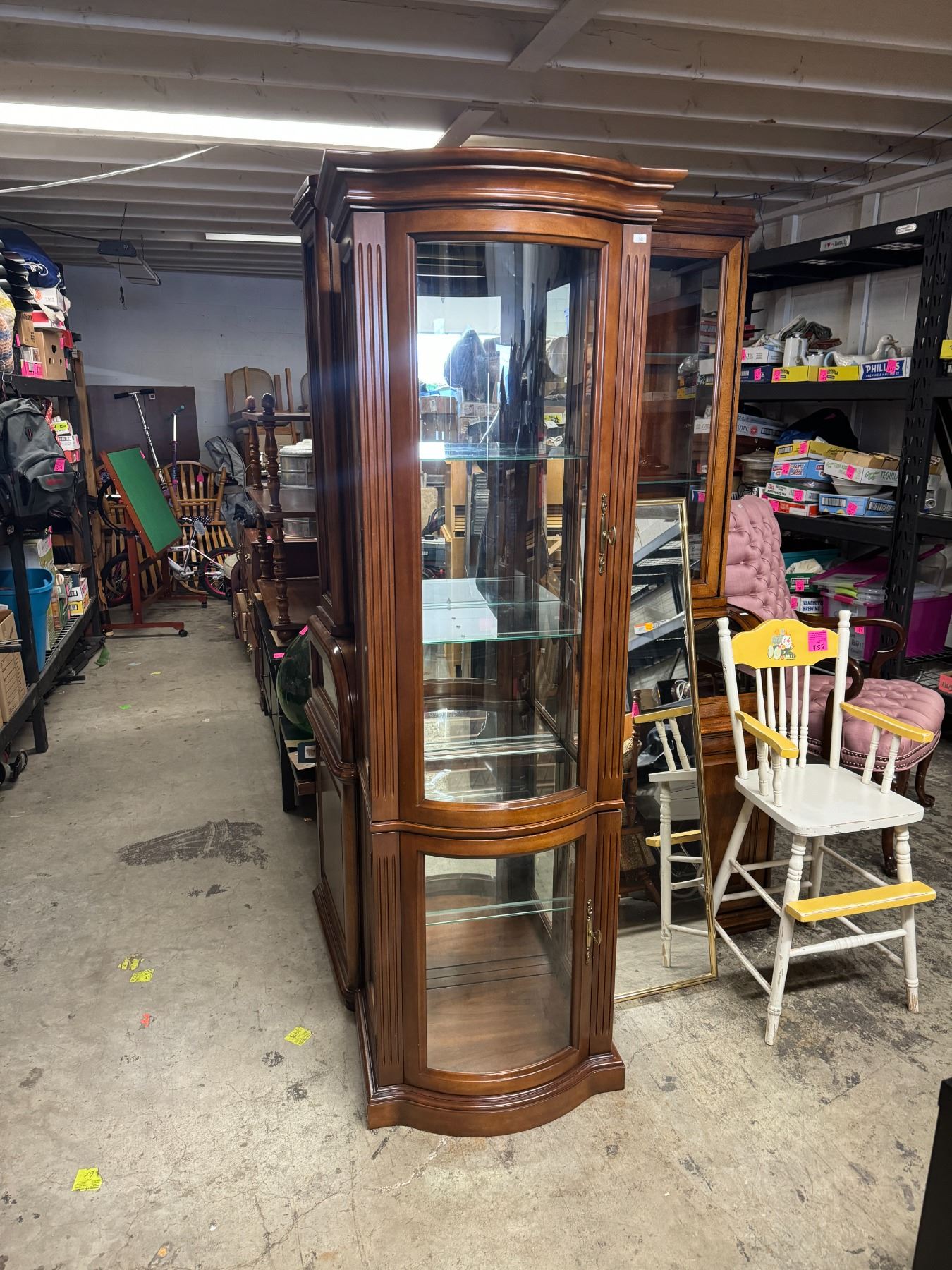 Lighted display cabinet 23 inches wide 16 inches deep 70 inches tall