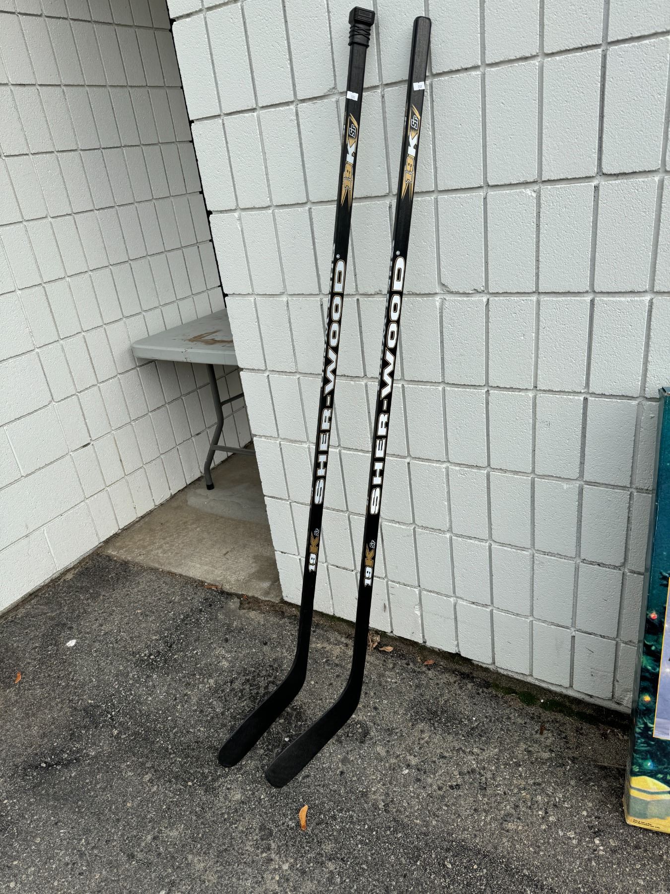 2 sherwood, right handed hockey sticks