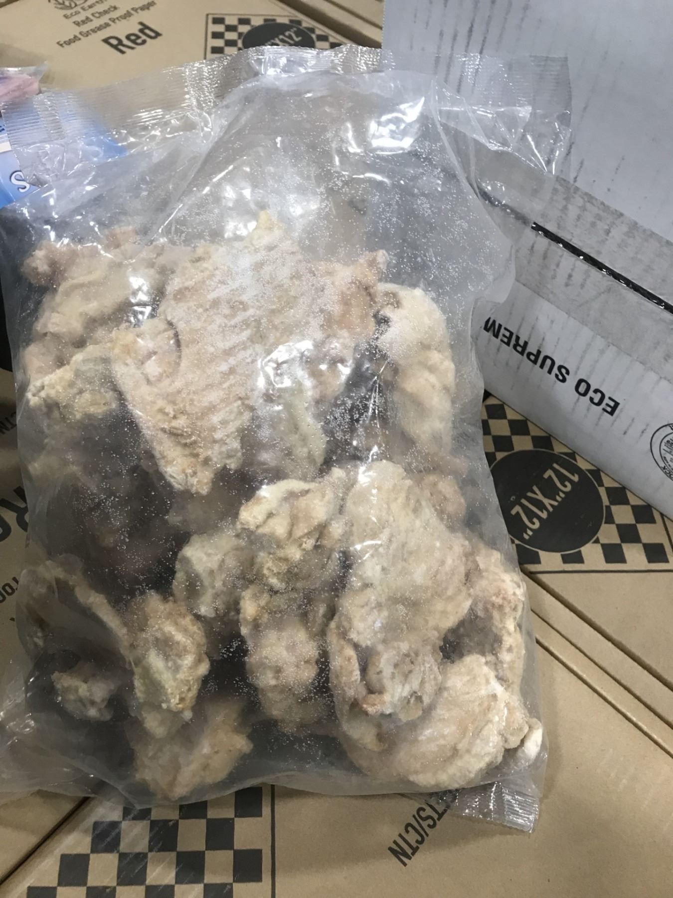 FROZEN: PARTIALLY COOKED SKINLESS BONELESS CHICKEN THIGH (5 LBS) - BAG