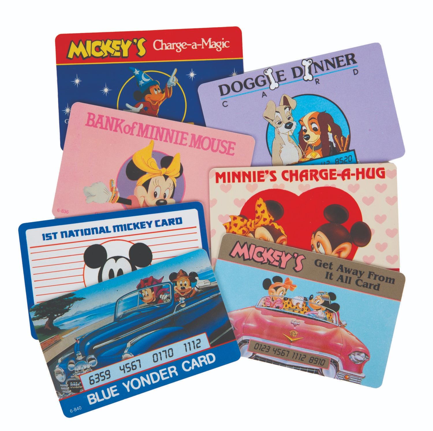 A Collection of Novelty Disney Charge Cards by OSP.