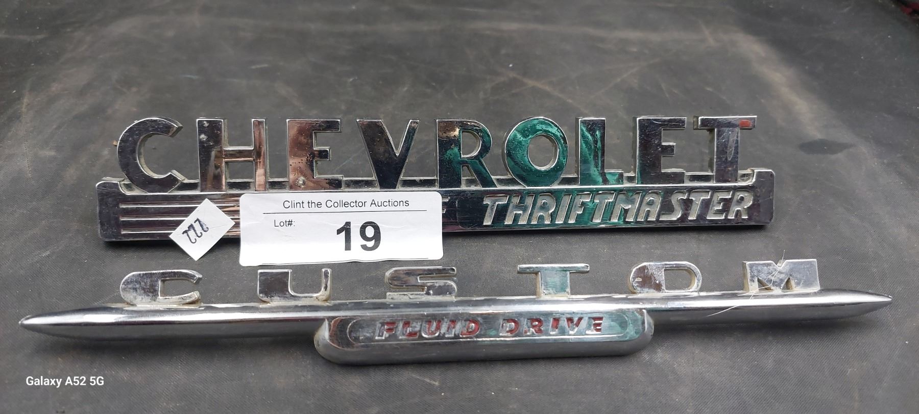 Pair of vintage car emblems, Chevrolet & Custom