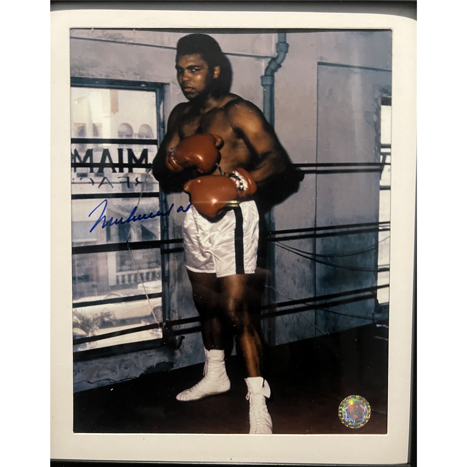 Muhammad Ali signed photo. GFA authenticated