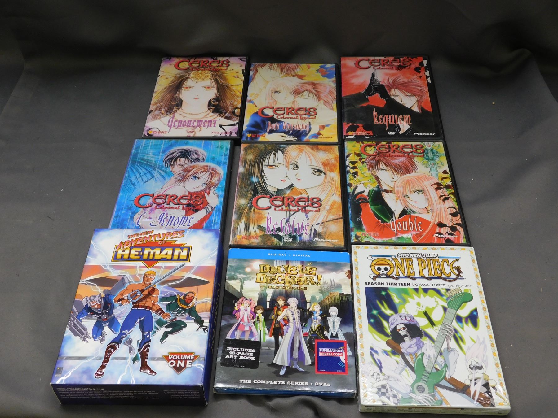 Lot of 9 Anime DVDs Ceres, One Piece, Double Decker, He-Man (2 sealed)