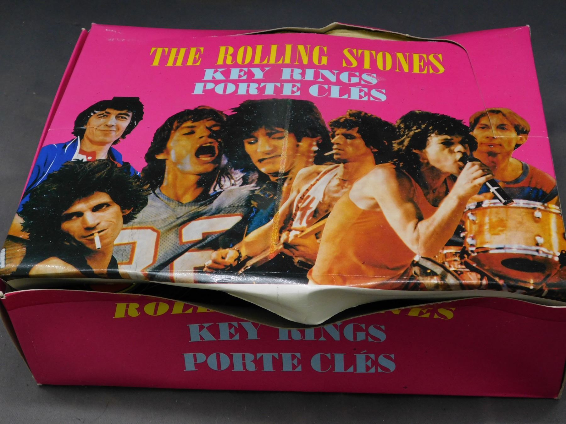 Case of 24 1983 Rolling Stones Keychains