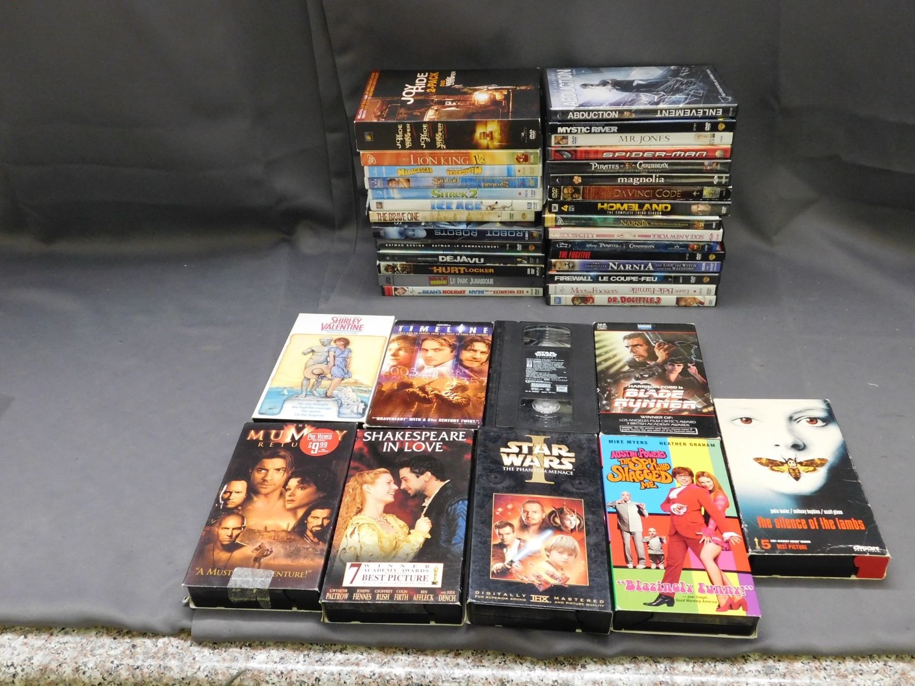 Lot of 38 DVD Movies and VHS Tape Movies Assorted Genres Titles