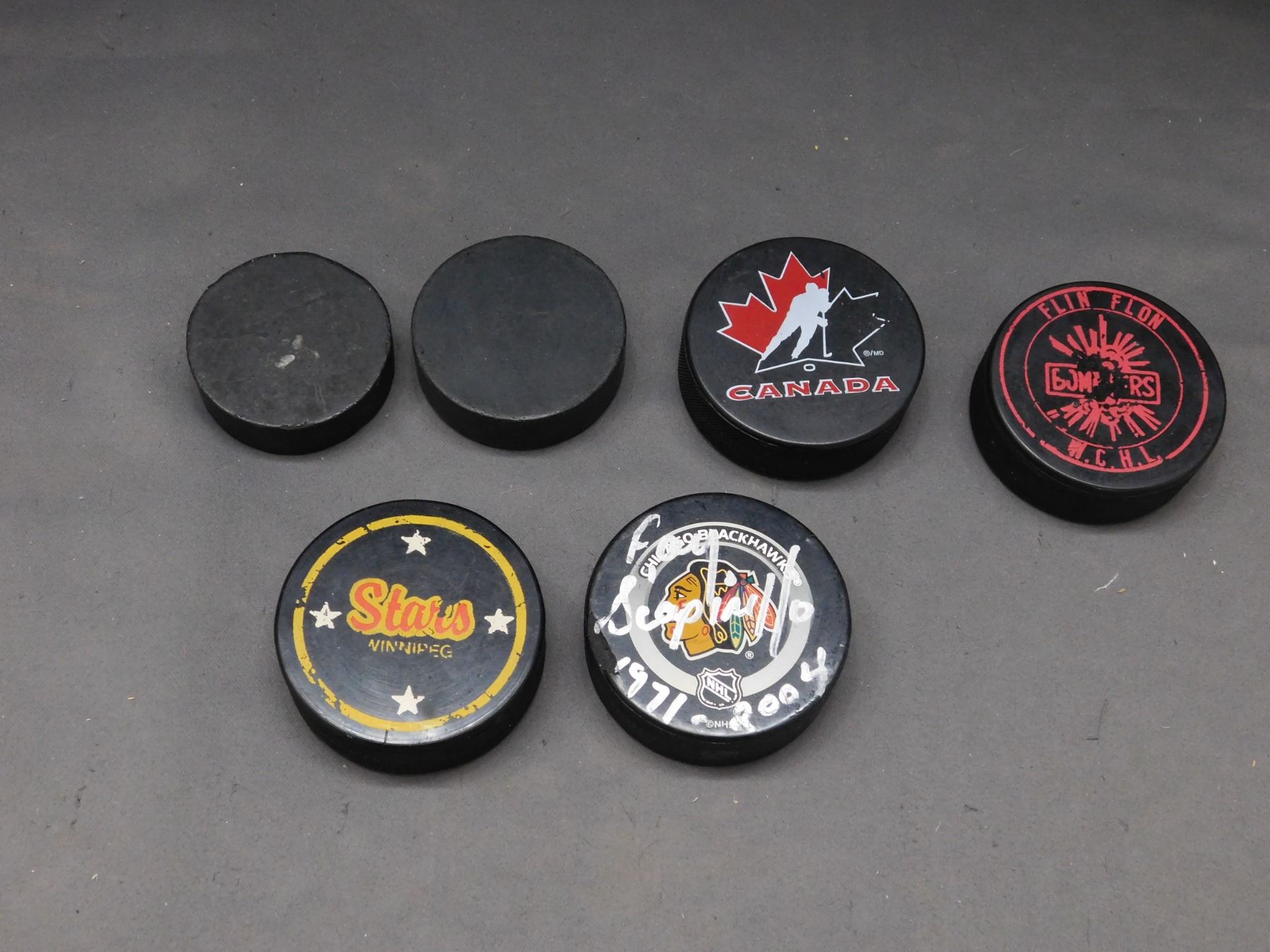 Lot of 6 Vintage Hockey Pucks 1 Signed by Ray Scapinello