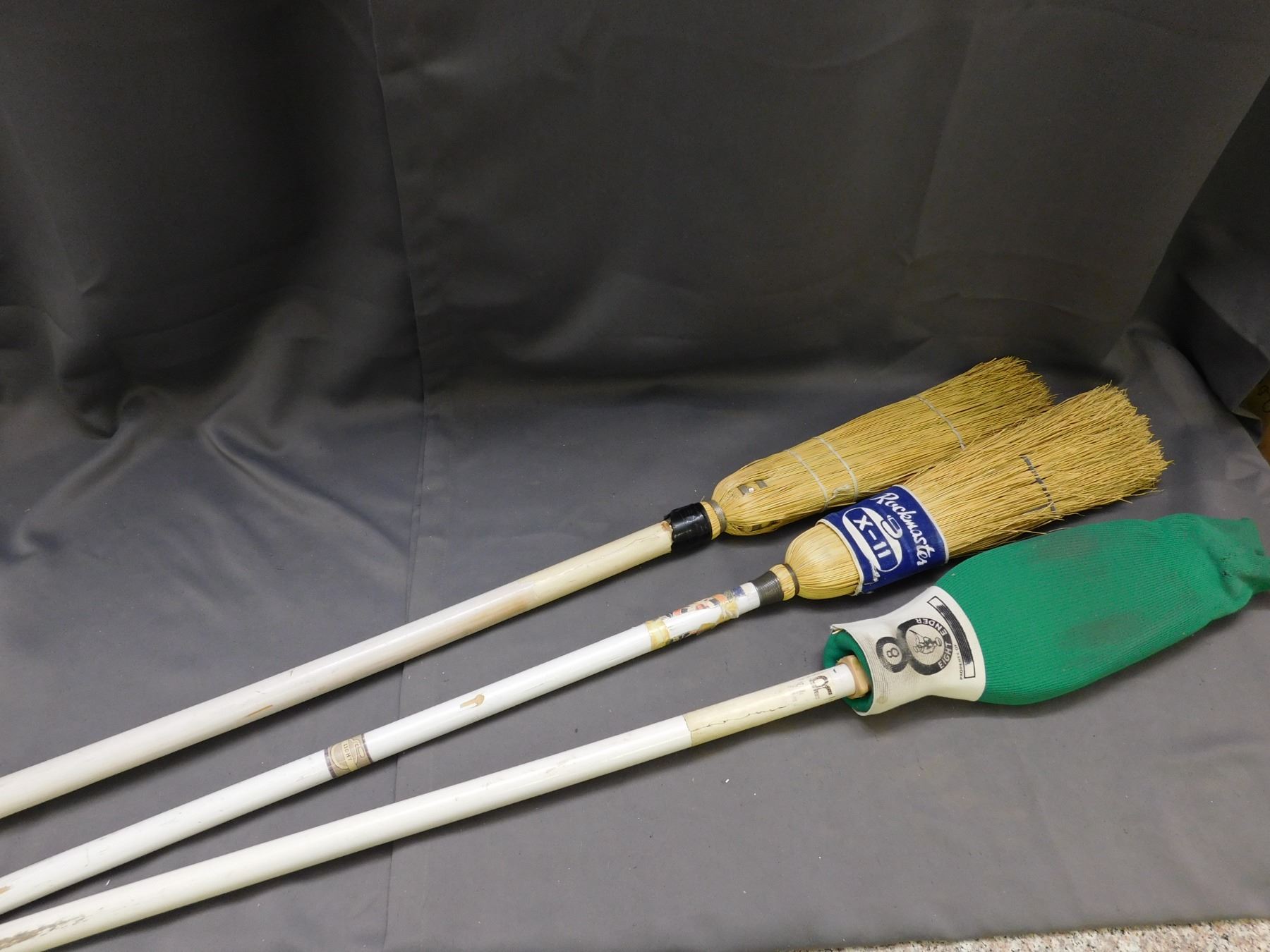 Eight Ender & Rockmaster Curling Brooms.