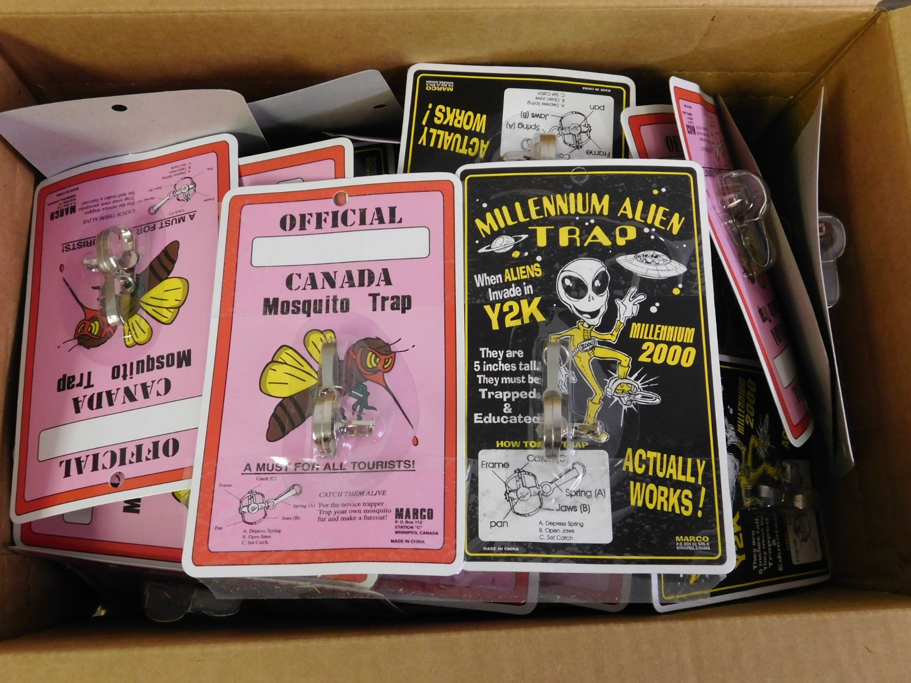60 NOS Novelty Alien and Canadian Mosquito Spring Traps