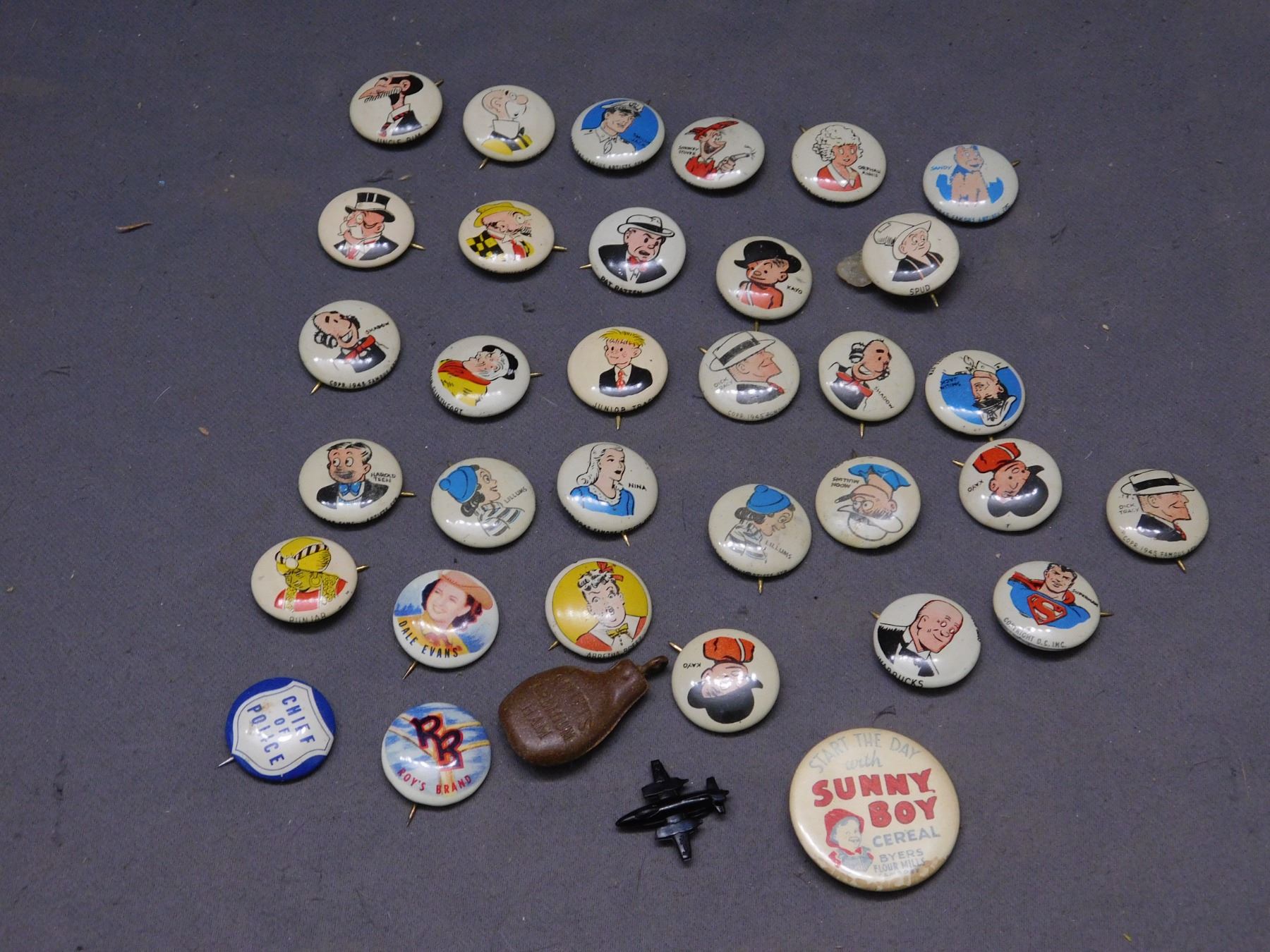 Lot of approx 30 1940s Kelloggs Pep Buttons, Superman, Dick Tracy