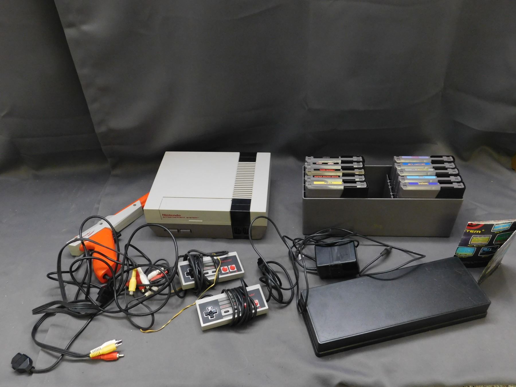 Nintendo NES Game Console, 2 Controllers, Gun, Cables and 10 Games in Case