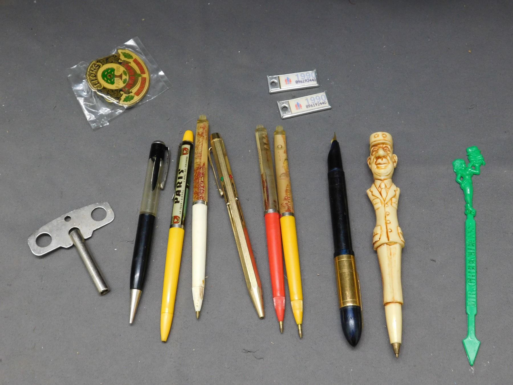 Junk Drawer Lot Floating Pens, Wind Up Clock Key, War Amp Tags, Novelty ...