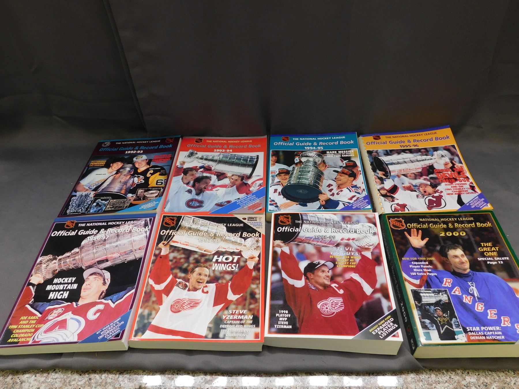 Lot of 8 1992-2000 NHL Official Guide and Record Books