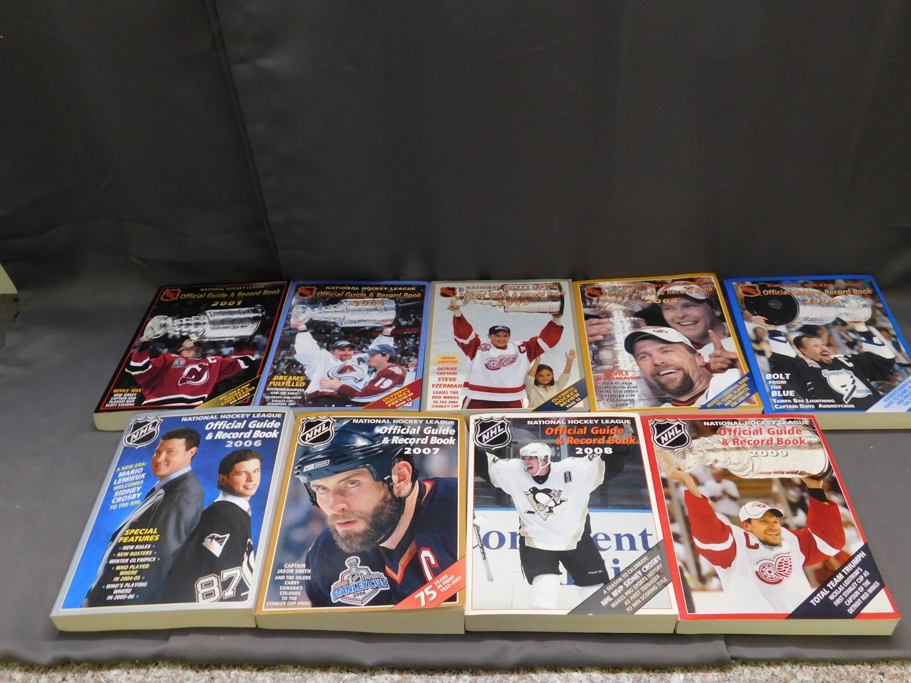 Lot of 9 NHL Official Guide and Record Books 2001-2009