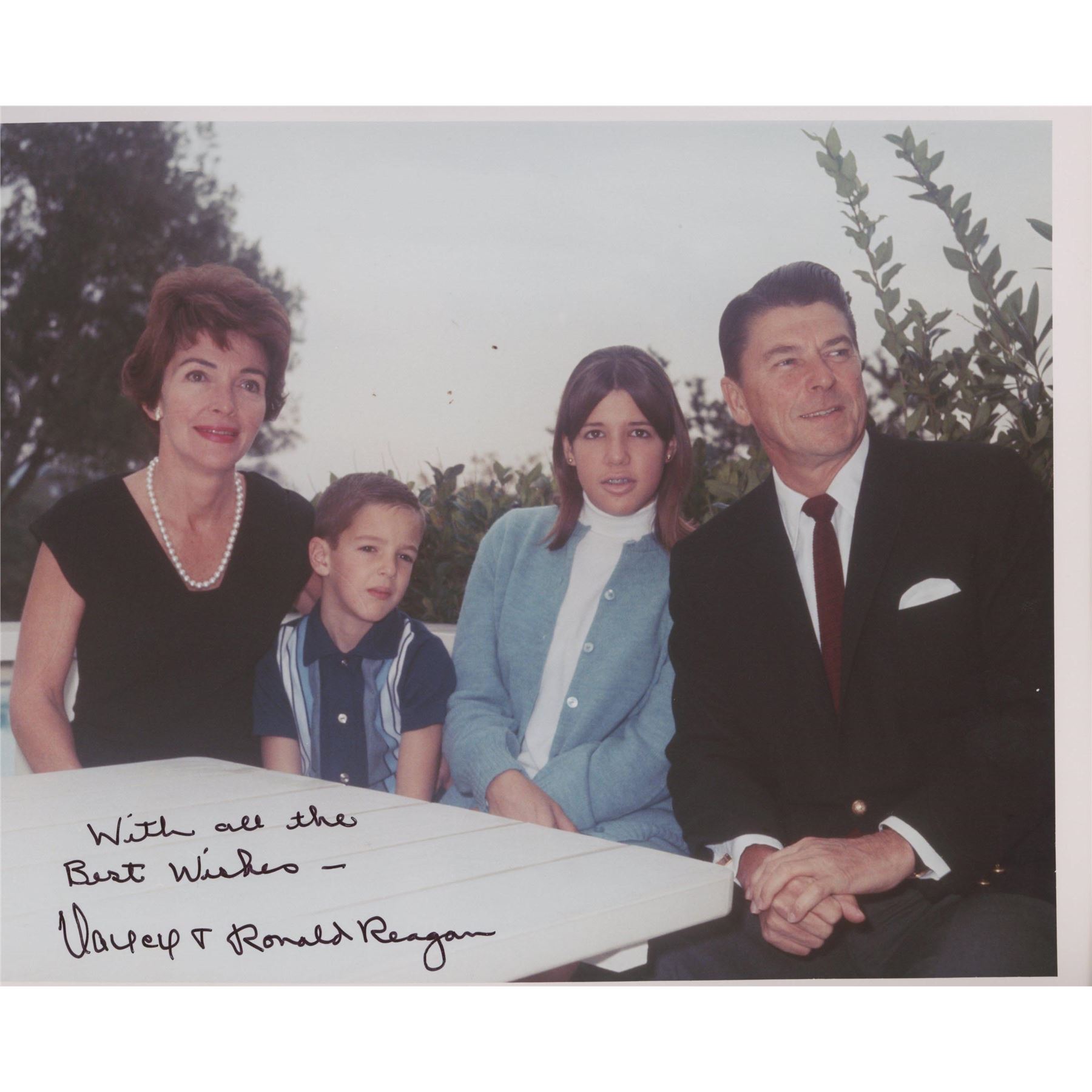 Reagan family signed photo. GFA Authenticated