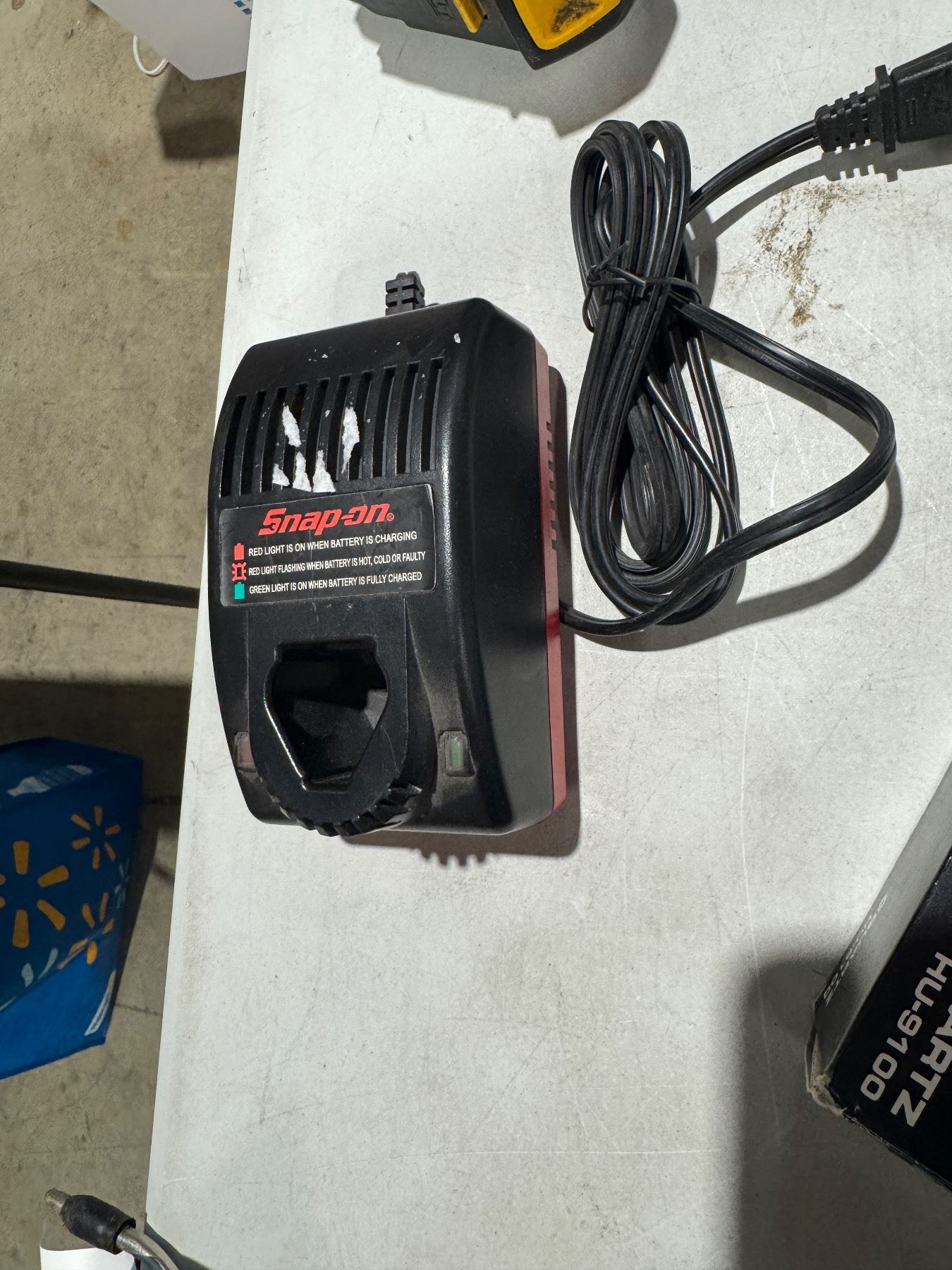 Snap-on battery charger