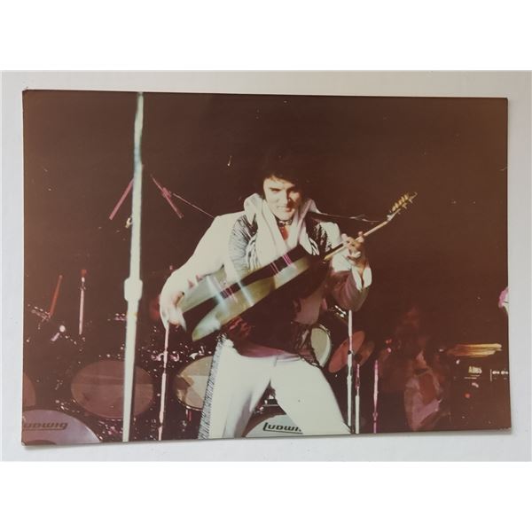 Vintage print of Elvis Presley on stage in the 1970's.