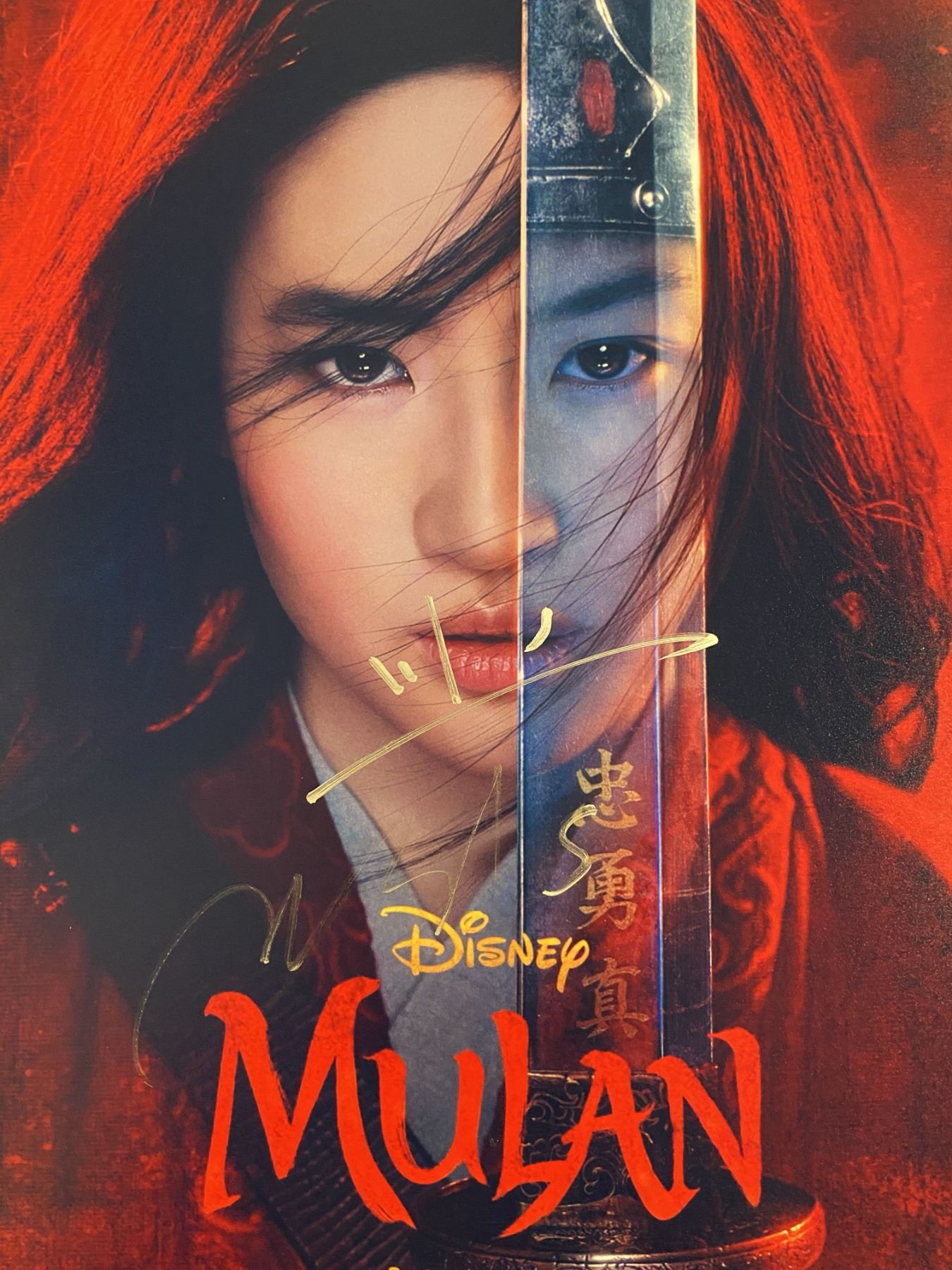 Disney Mulan signed movie photo autographed by Liu Yifei. 8x10 inches