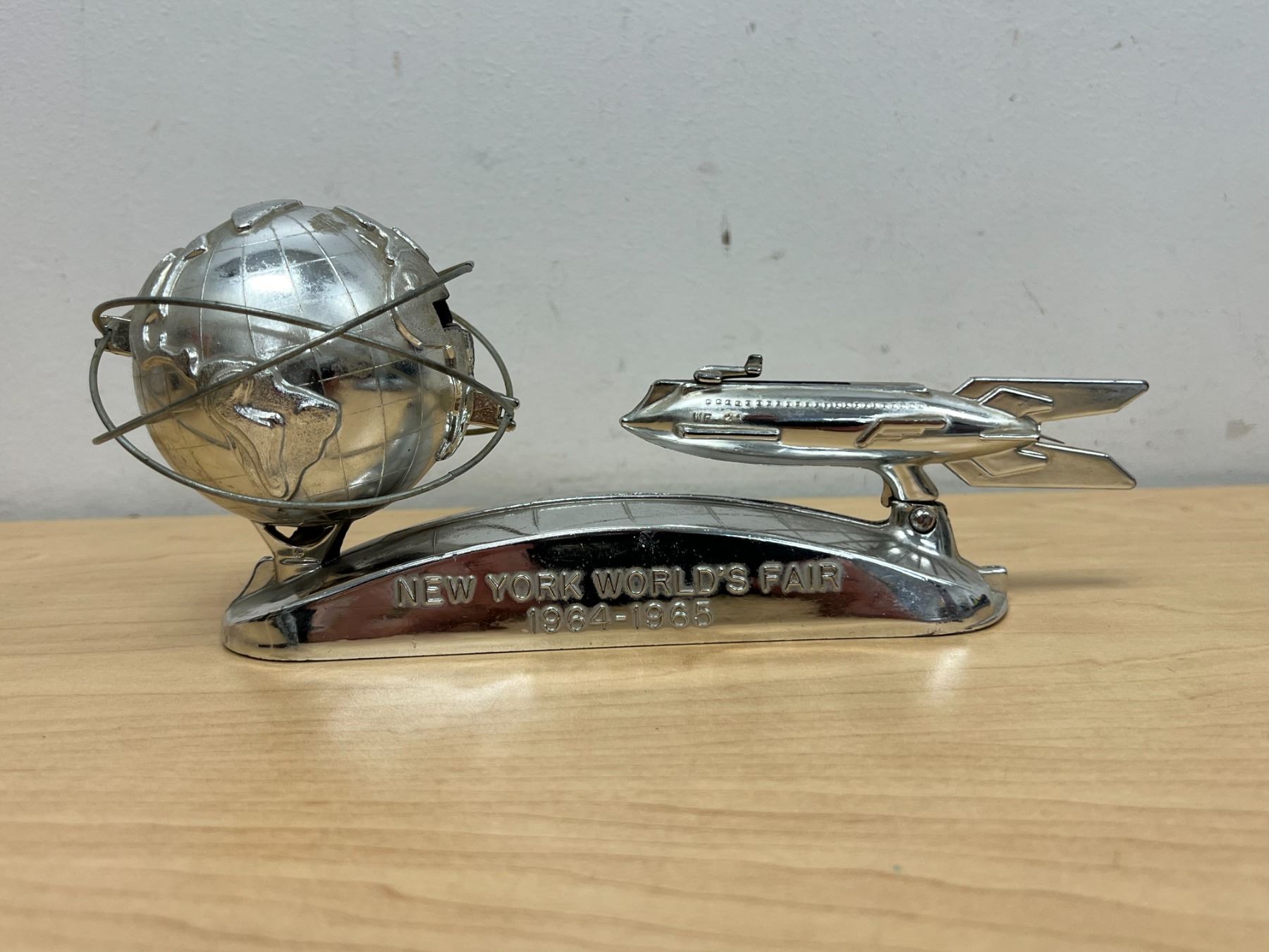 1964-1965 New York World's Fair Mechanical Unisphere Rocket Ship Coin Bank