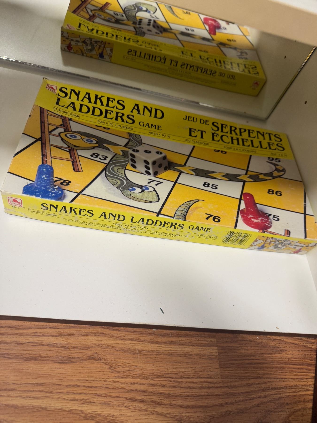Snakes and ladders board game