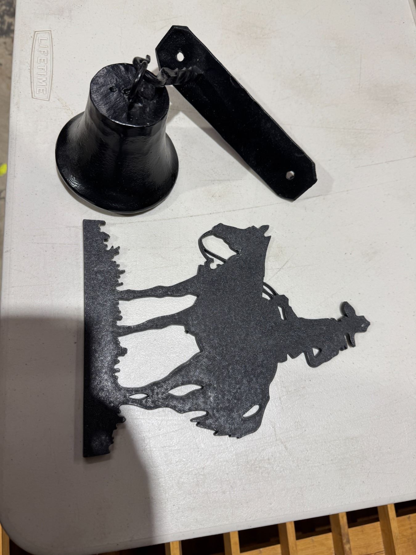 Bell And, cowboy silhouette