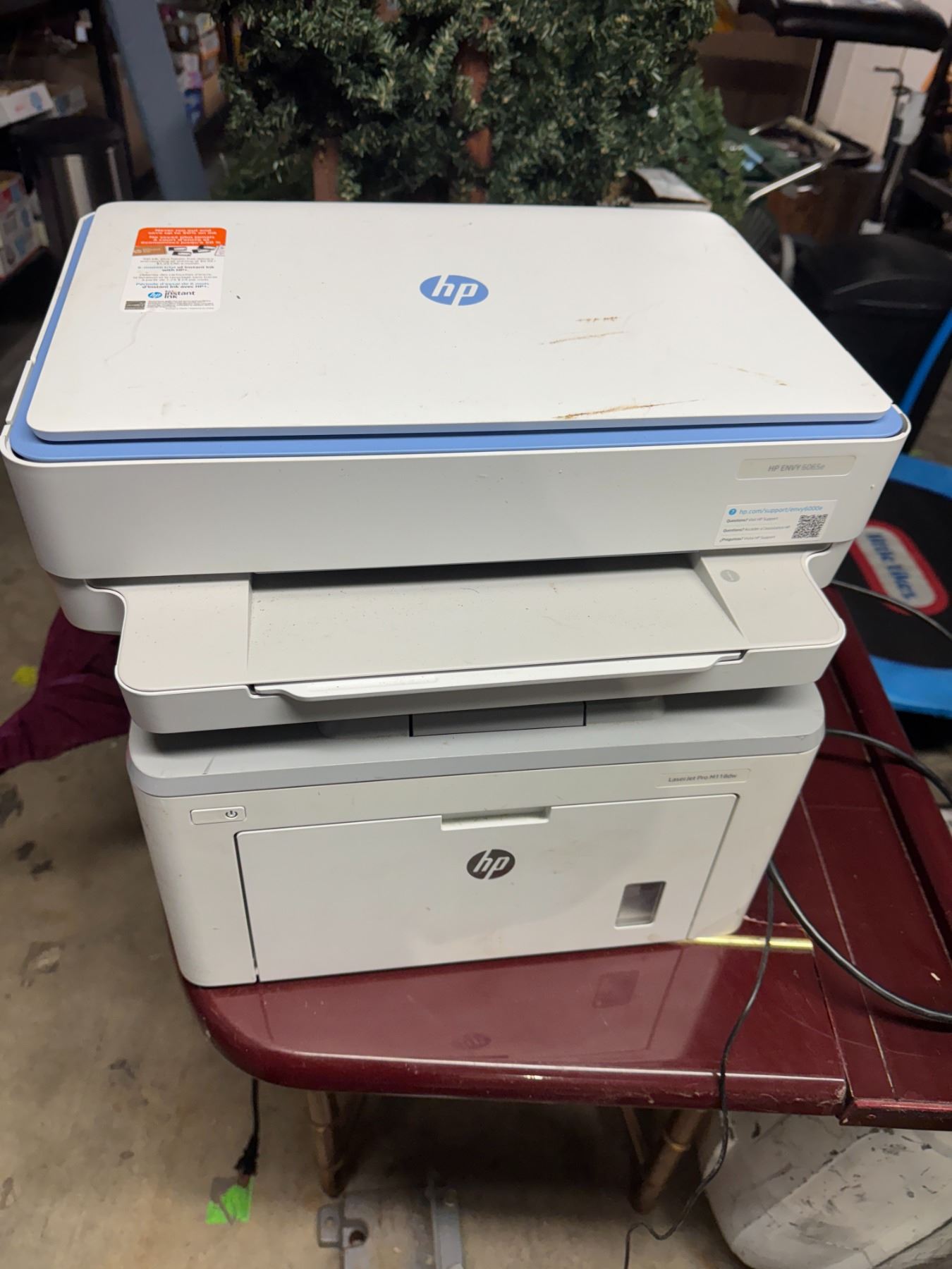 HP LaserJet Pro M1 18DW and HP envy 6065E printers