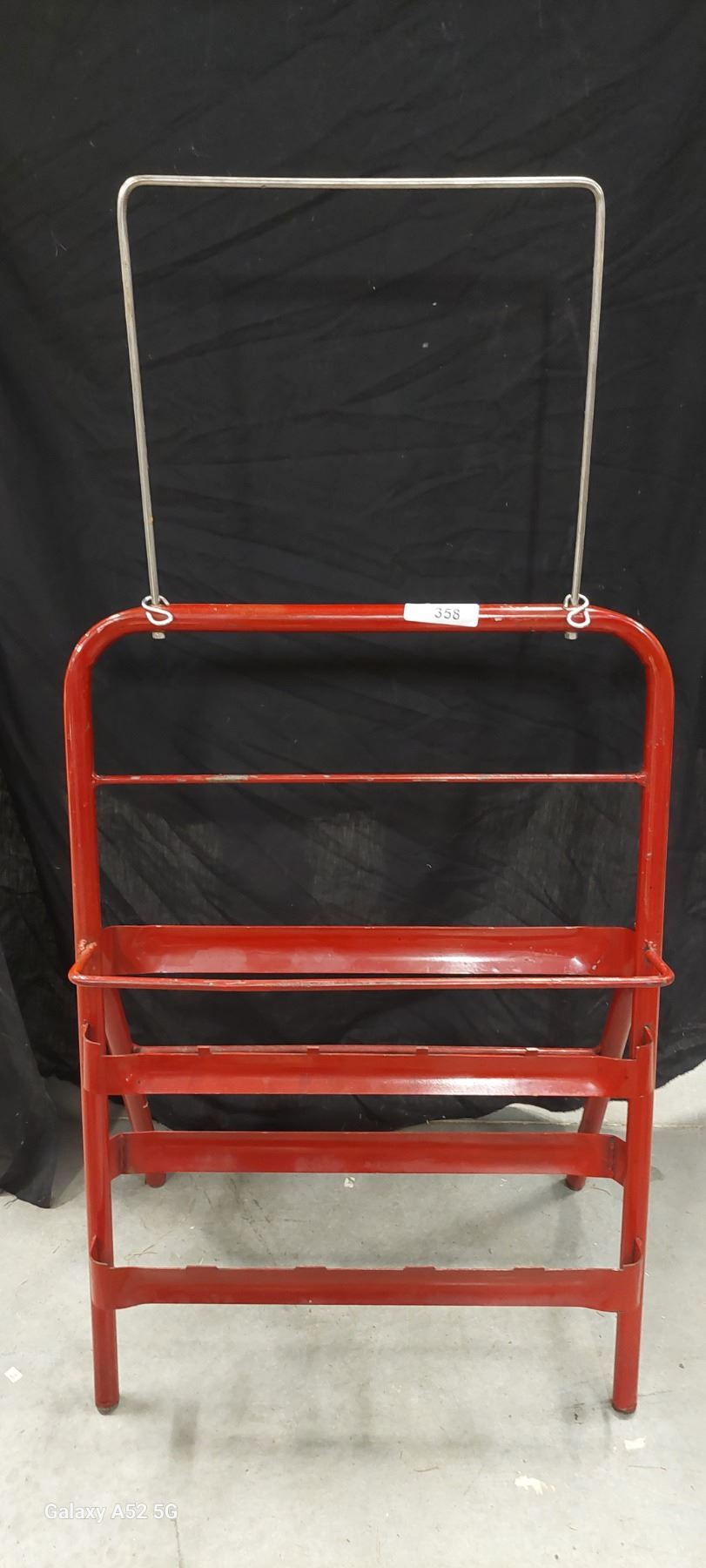 Vintage curb stand motor oil rack 22"x46"