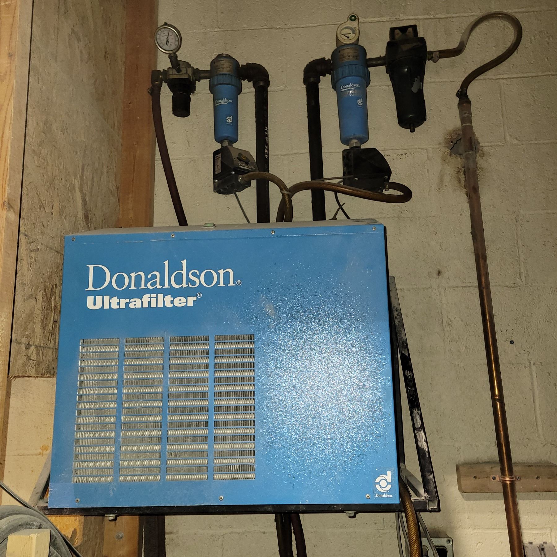 Donaldson ultra filter c/w gauges & filters on the wall & steel shelf ...