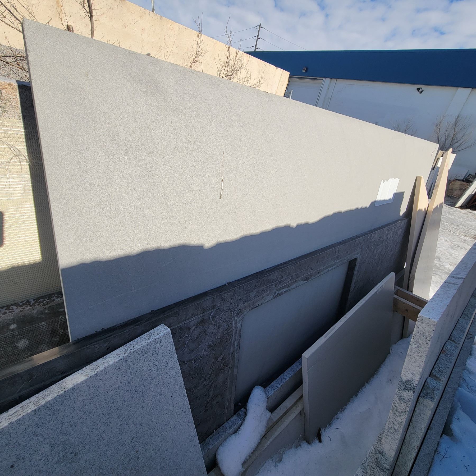 5- Partial slabs of jasmine white granite