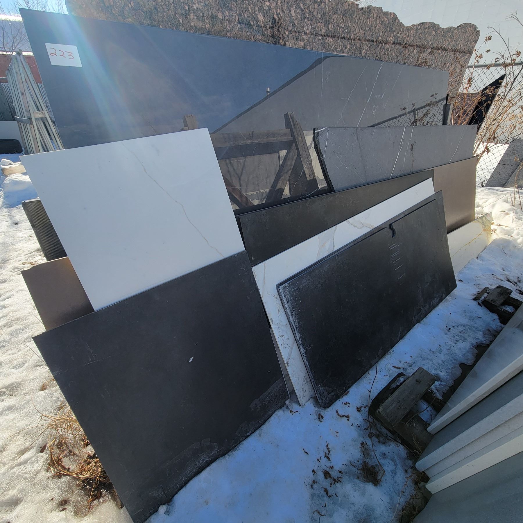 1- Full slab of porcelain, qty of various partial slabs of porcelain ...