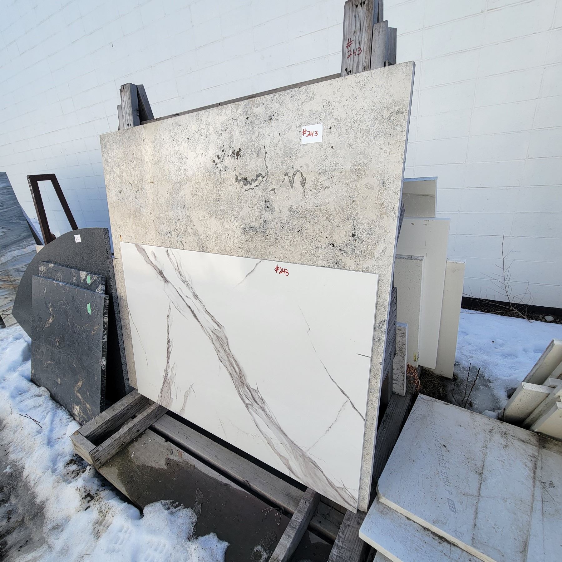 Large qty of various partial slabs of quartz, limestone & porcelain c/w ...