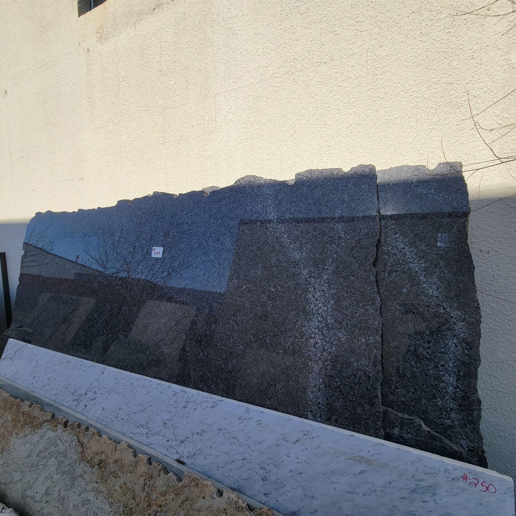 1- Full slab & 2- partial slabs of coffee green granite c/w metal A-frame