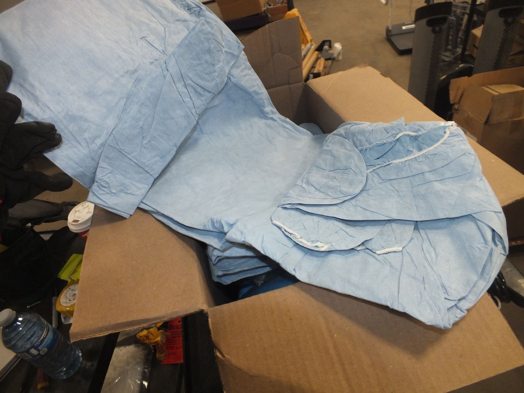 2 Boxes Of Assorted Disposable Coveralls
