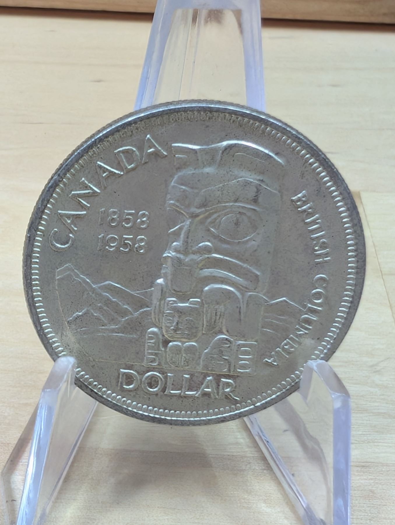 Lot 35-1) 1 Canadian silver Dollar 1958